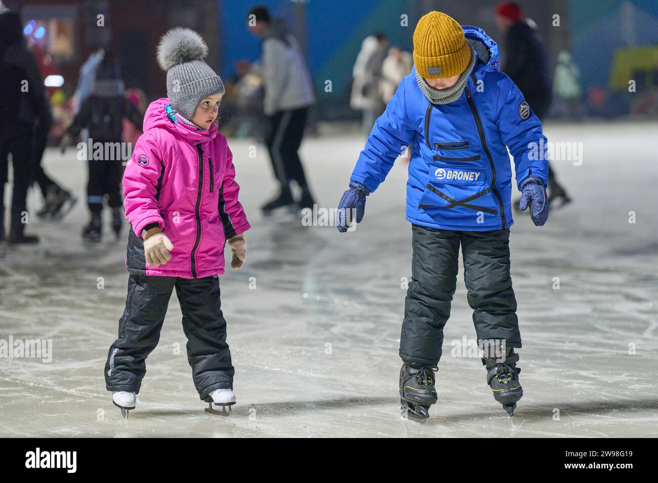 Vladivostok, Russia. 25th Dec, 2023. People skate at the "Pioneer" ice ...