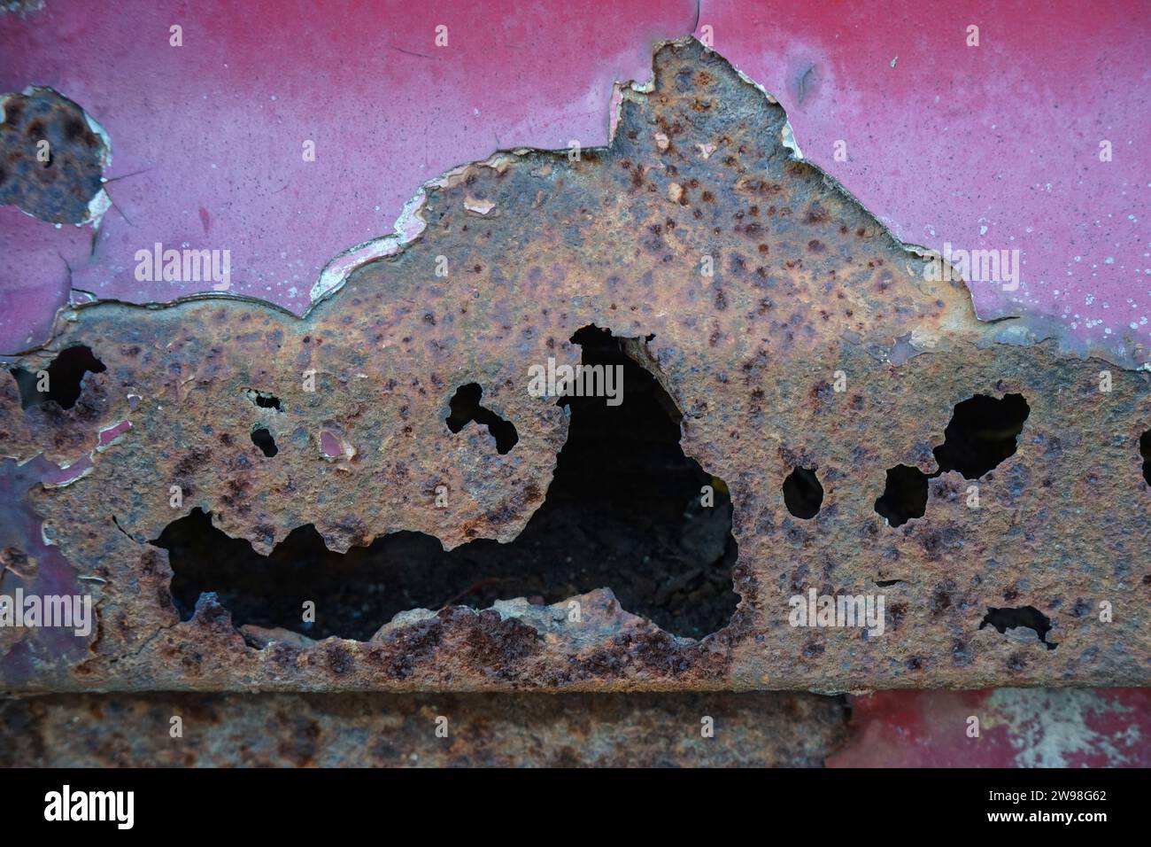 rusted and punctured red metal surface Stock Photo - Alamy