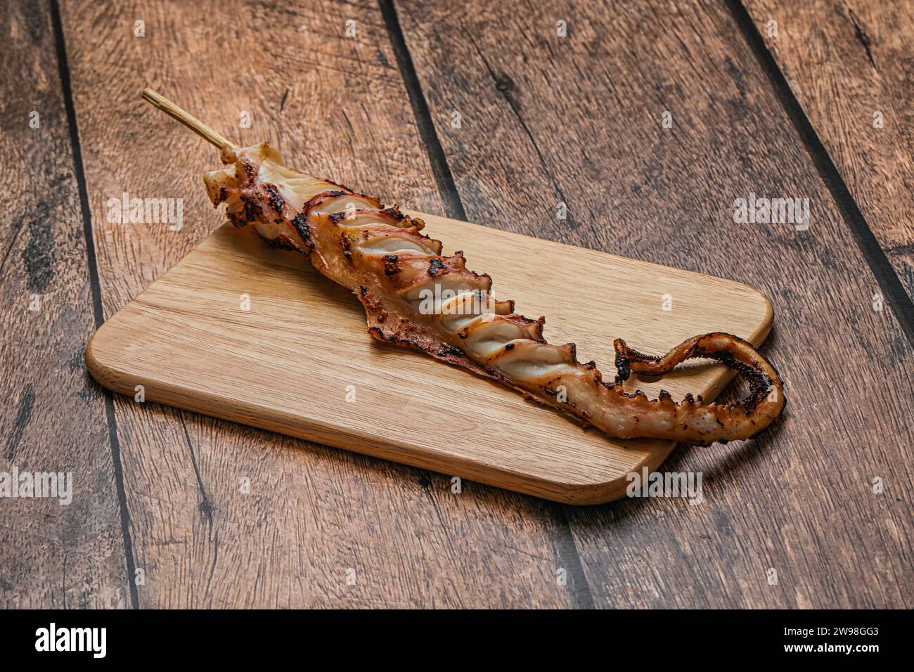 Delicous tasty Grilled octopus tentacle snack Stock Photo - Alamy