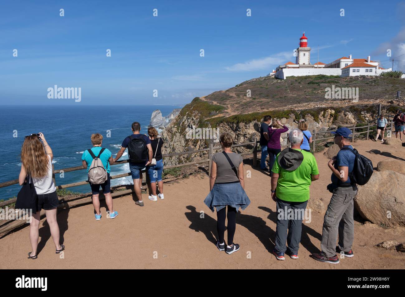 People at scenic Cabo da Roca in Portugal, viewpoint and historic ...