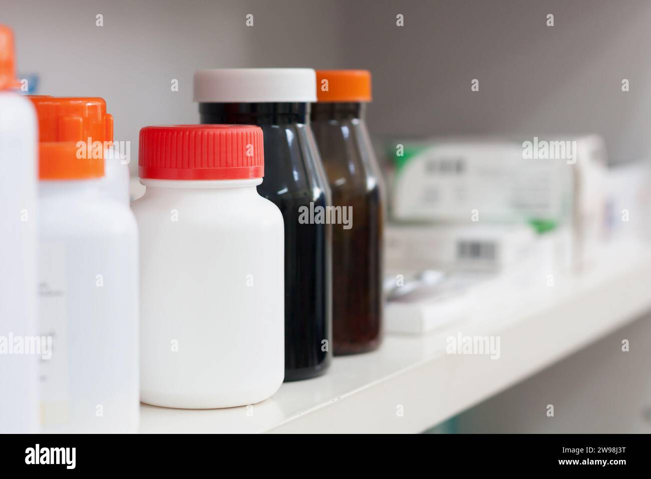 medicine bottles on pharmacy store shelf Stock Photo - Alamy