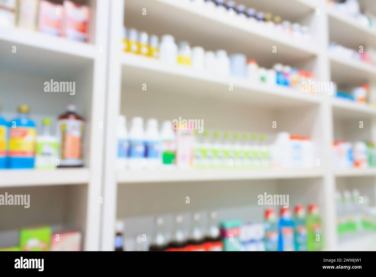 medicines arranged on shelves in the pharmacy blurred background Stock ...
