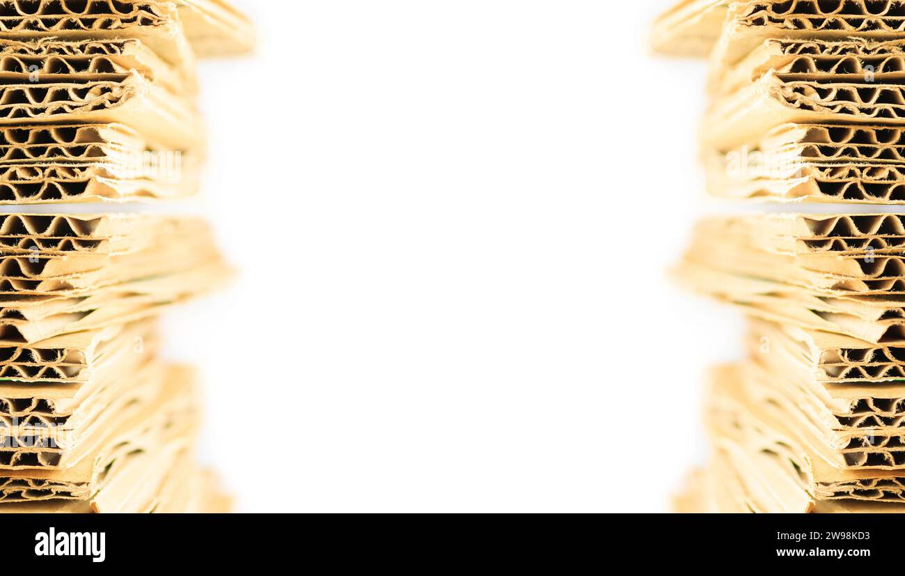 Cardboard stack isolated on white background Stock Photo - Alamy