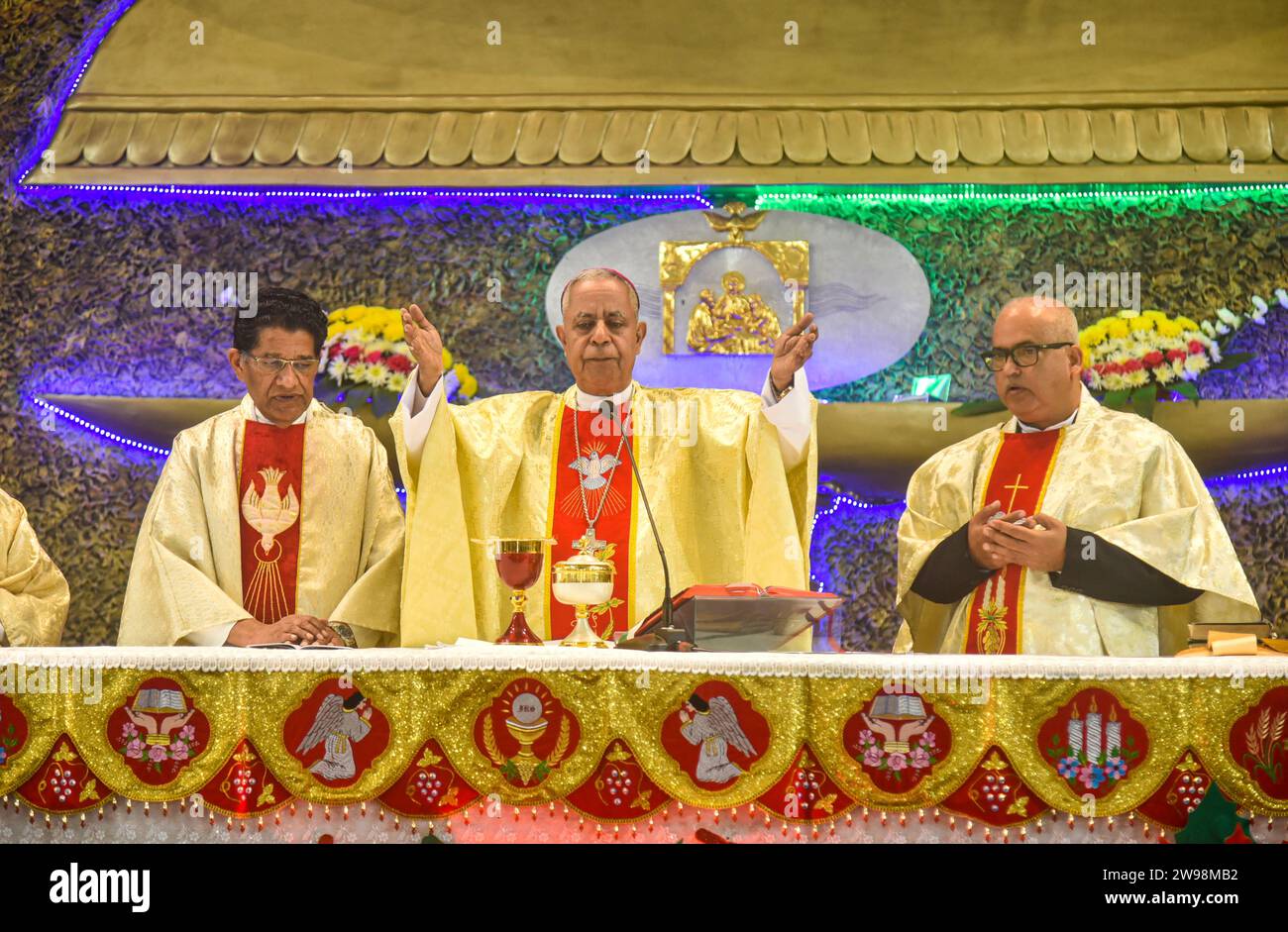 GUWAHATI,INDIA- DECEMBER 25: Priest leads a ritual prayer during a ...