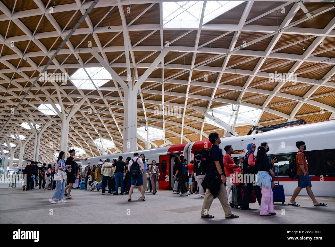 Jakarta, Indonesia. 25th Dec, 2023. Passengers walk on the platform of ...