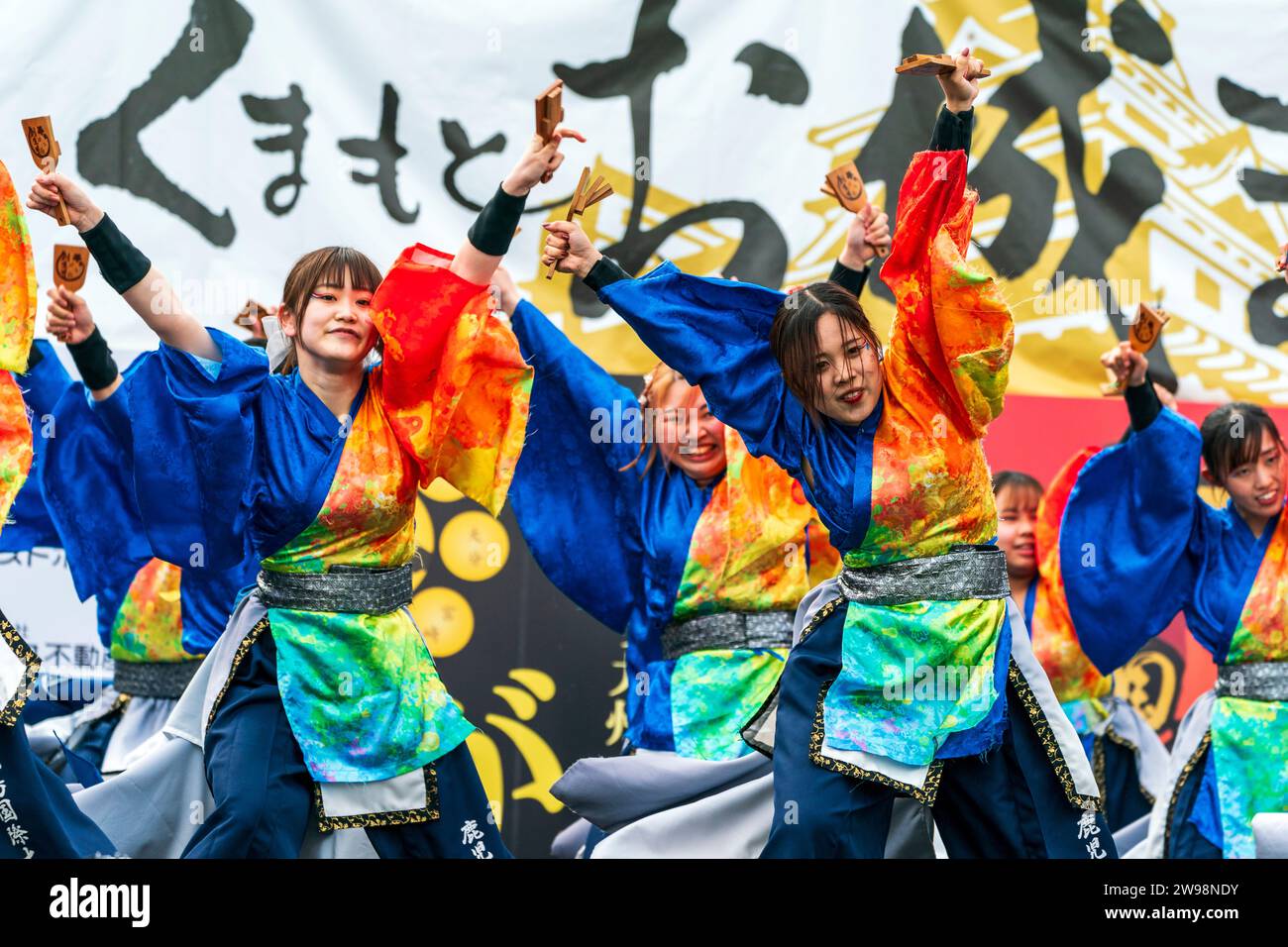 Japanese women yosakoi dancers on stage dancing in colorful yukata ...