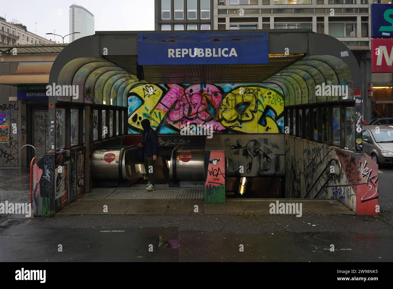 The graffiti covered subway entrance to Republica station in Milan ...