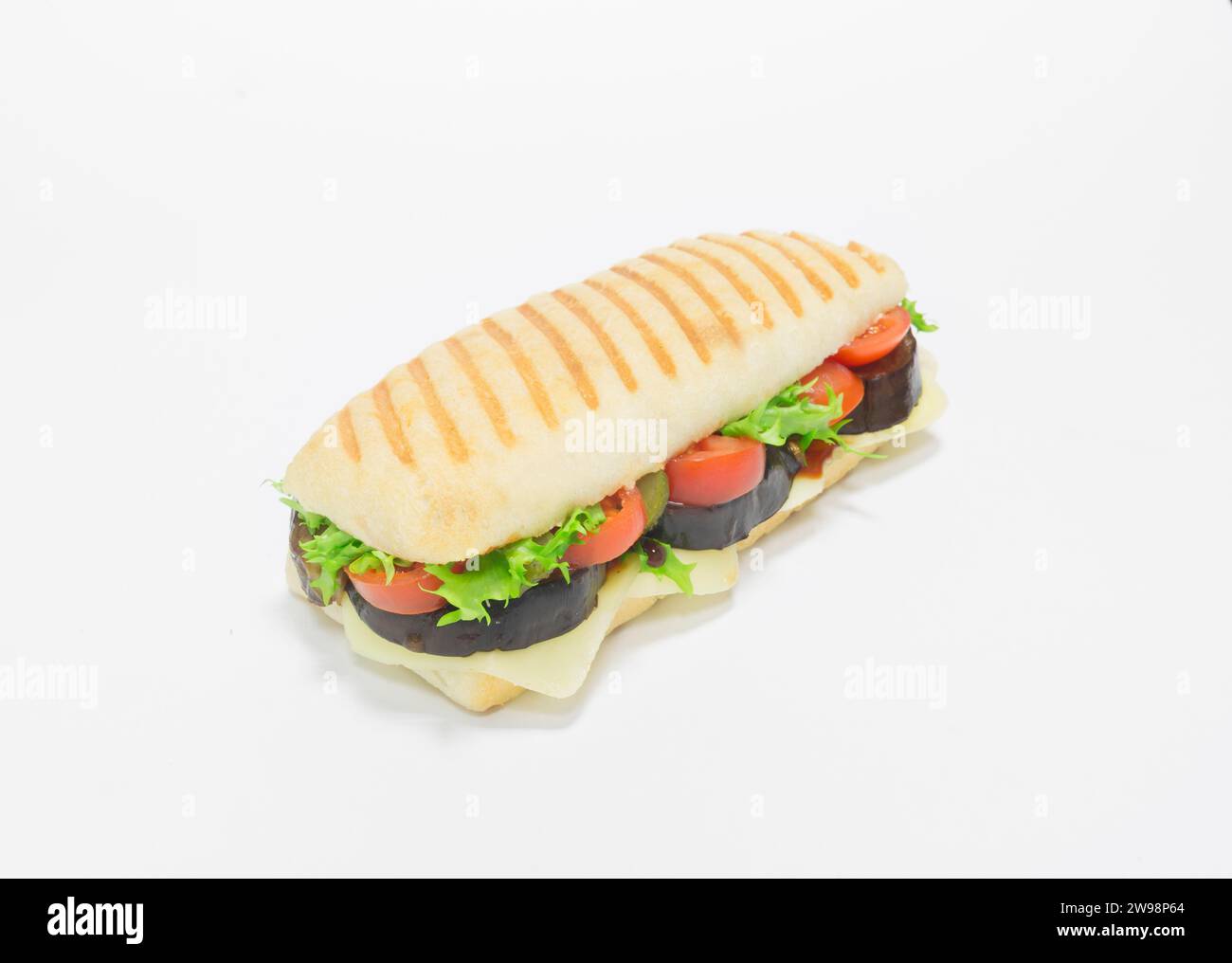 Gourmet panini with eggplant, tomatoes and cheese. Top view. White ...