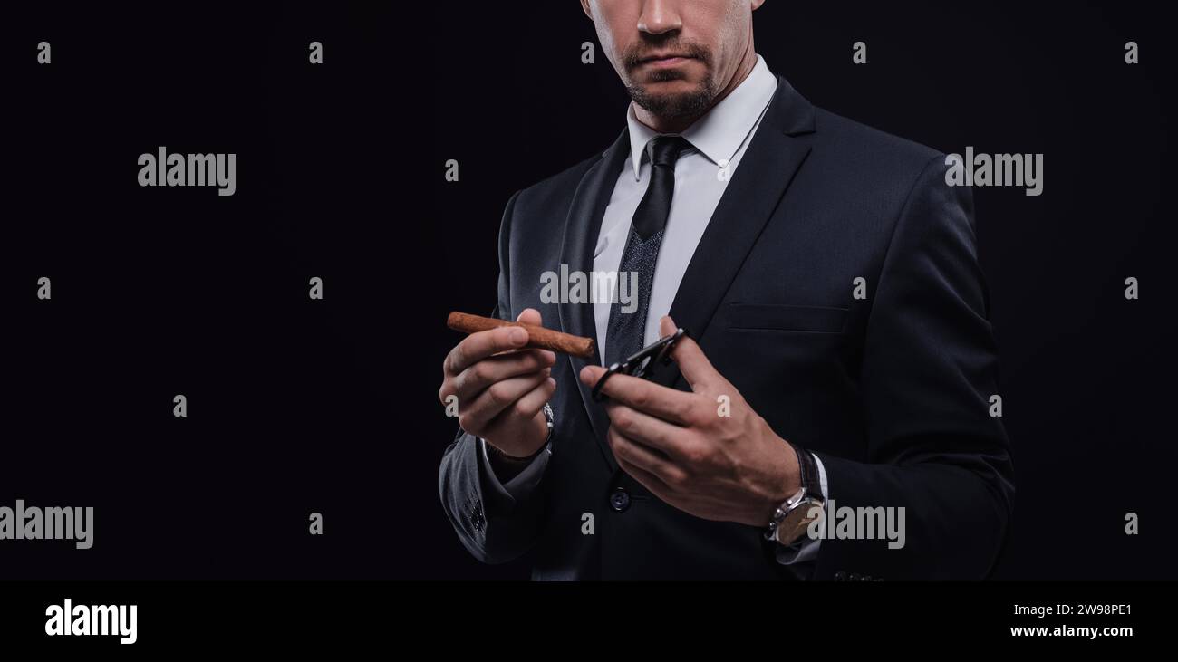 Image of an adult stylish man in a suit with a cigar. Cigar clubs ...