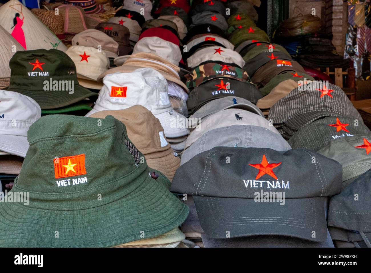 Caps and hats with red Vietnam star, Vietnam Stock Photo - Alamy