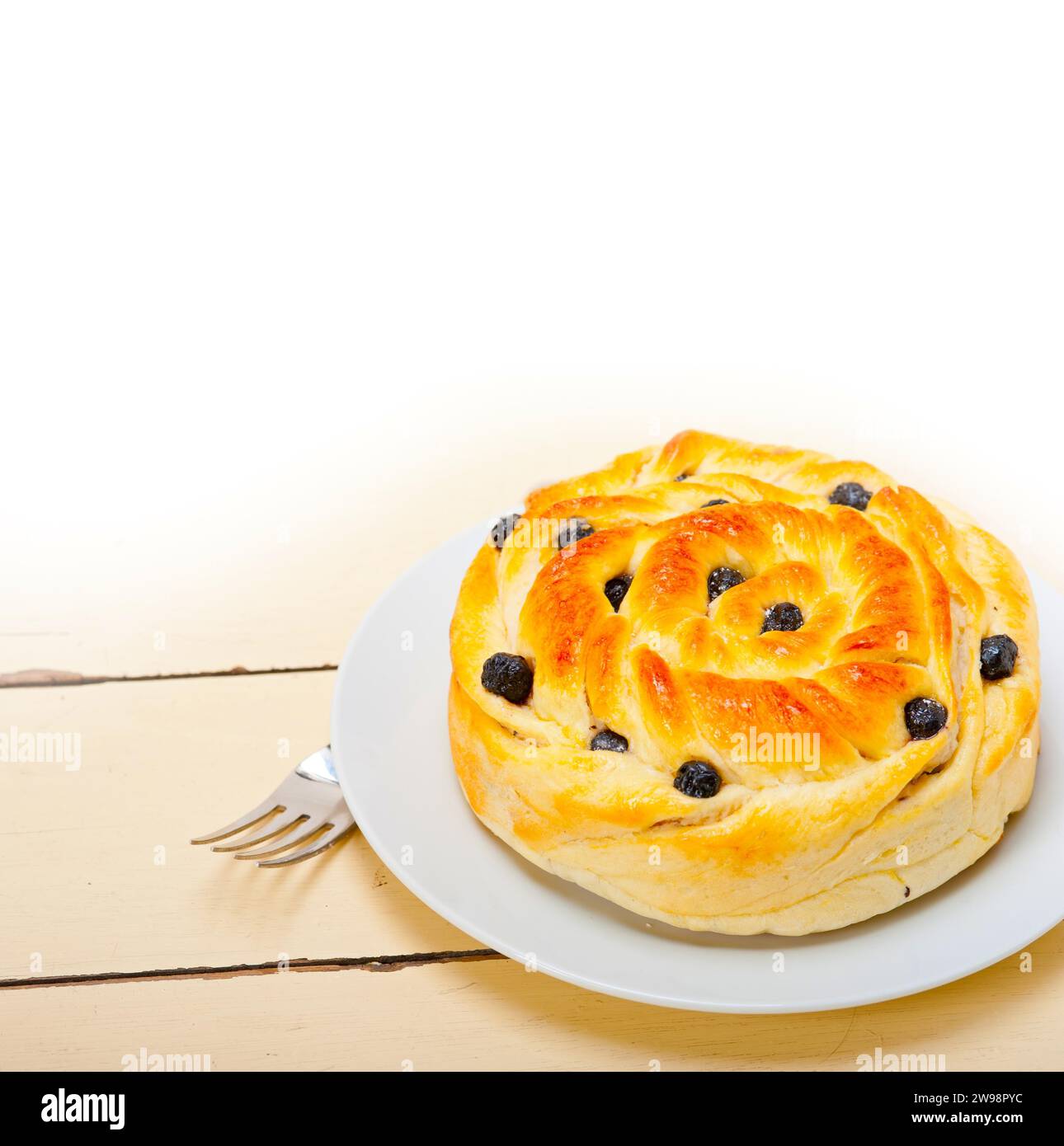 Fresh home baked blueberry bread cake dessert over white wood table ...