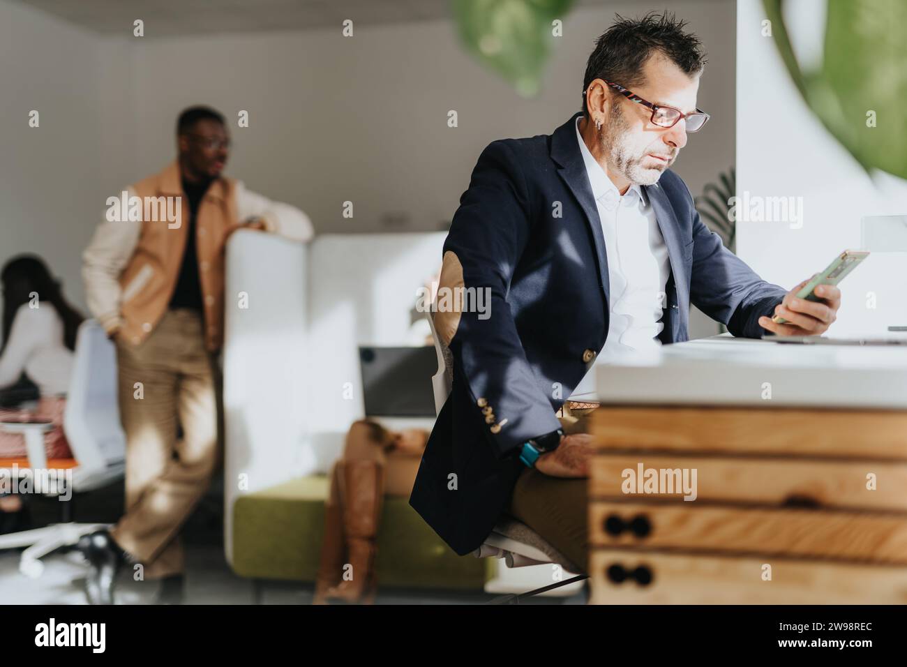 Successful collaboration and teamwork in a modern workplace Stock Photo ...