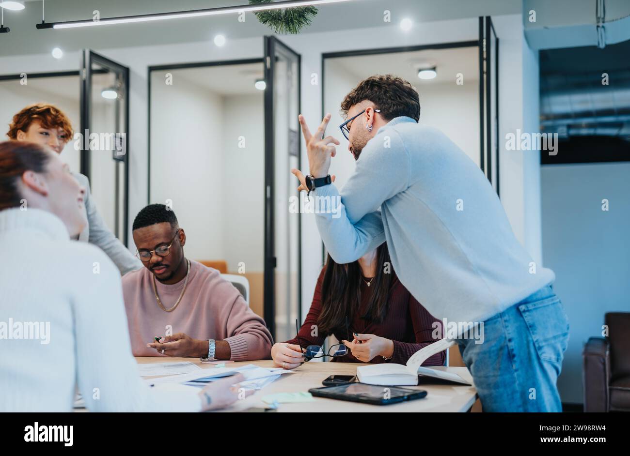 Business colleagues celebrating a successful project completion in an ...