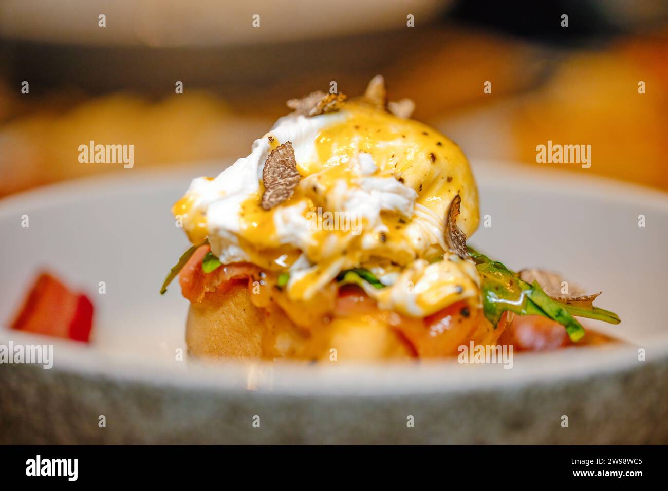 Gourmet Eggs Benedict on Toasted Brioche with Truffle. Culinary art and ...
