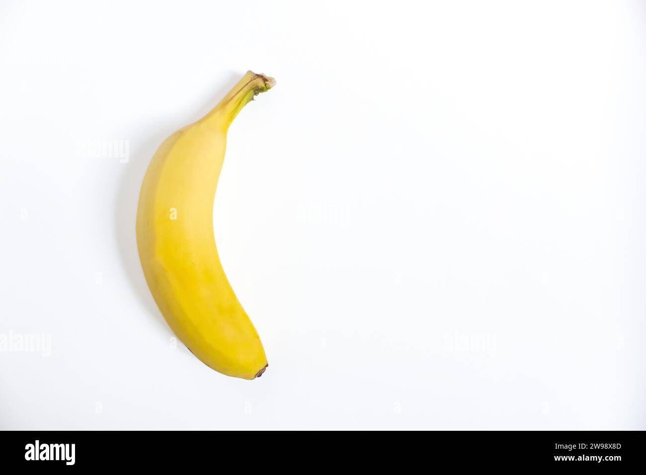 Ripe single banana isolated on white background. Top view, flat lay ...