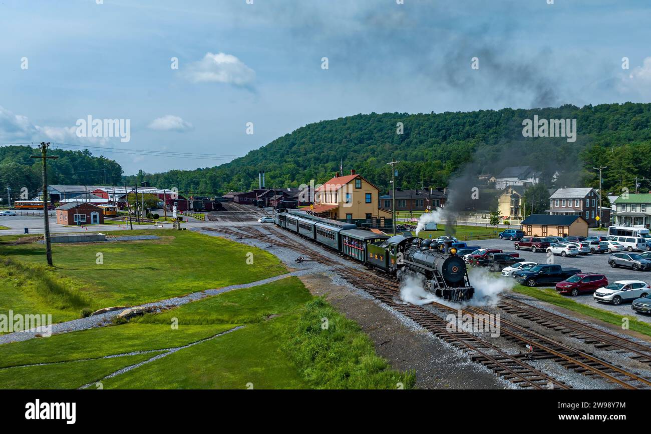 An Aerial View of a Narrow Gauge Steam Passenger Train, Leaving the ...