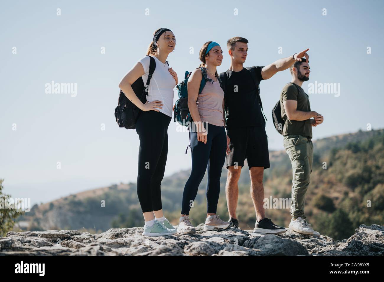 Friends explore the forest, hike mountains and talk different topics ...