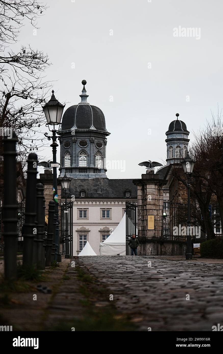 A vertical shot of a cobblestone trail to the historic Schloss Bensberg ...