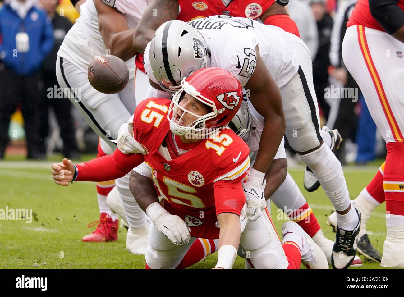 Kansas City Chiefs quarterback Patrick Mahomes (15) fumbles as he is ...