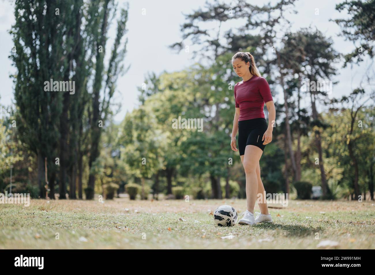 Athlete Enjoying Outdoor Training with Soccer Ball in Natural ...