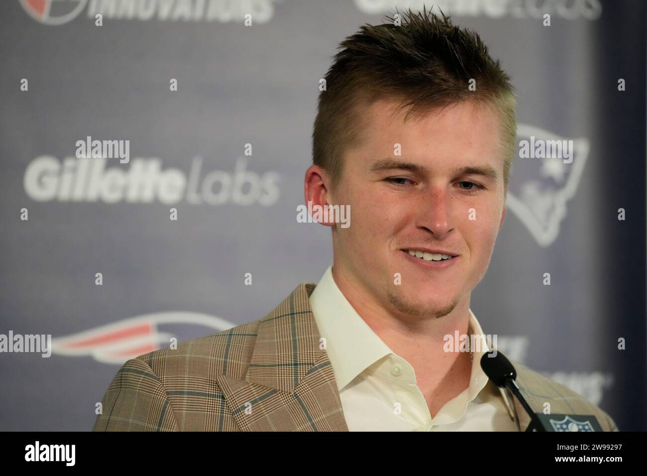 New England Patriots quarterback Bailey Zappe (4) speaks during a news ...