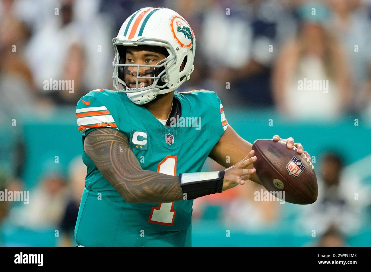 Miami Dolphins quarterback Tua Tagovailoa (1) looks to pass during the ...