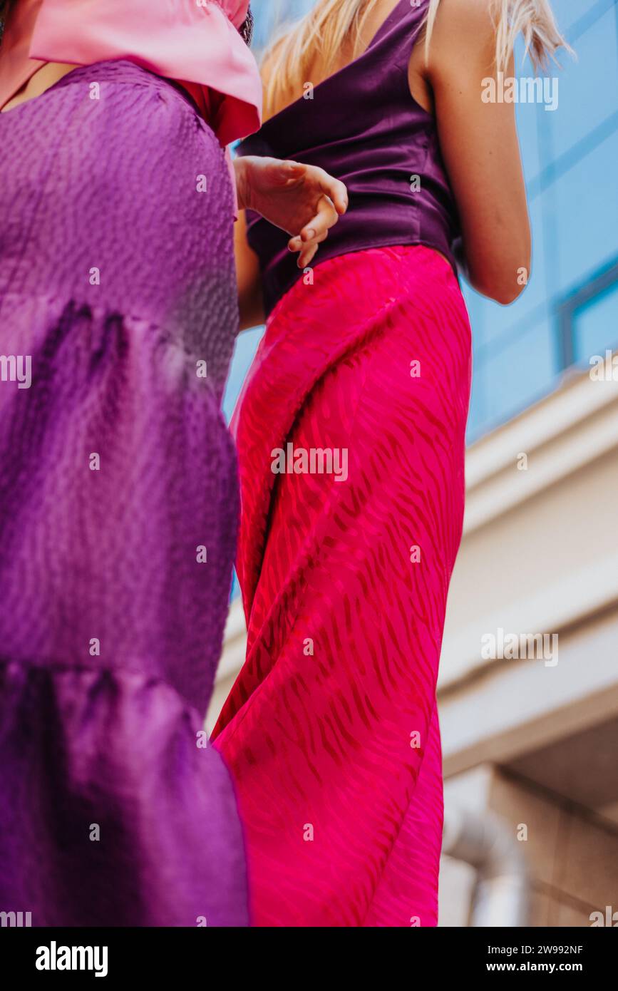 Confident ladies embrace urban city life in trendy outfits with shades ...