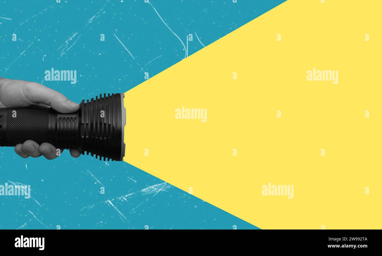 Modern art collage depicting a hand holding a flashlight. Concept of ...