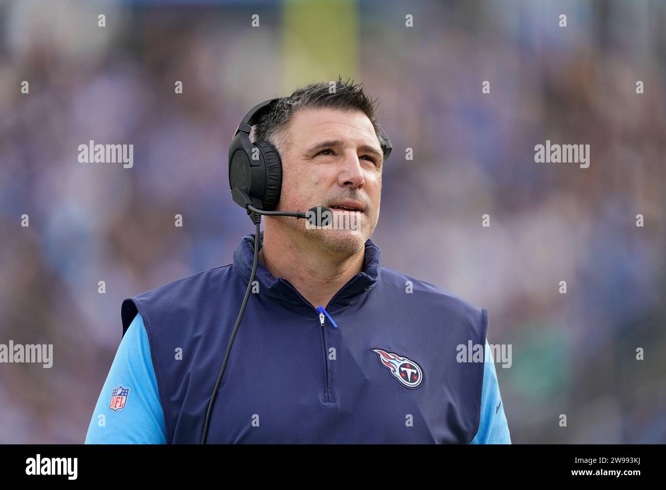 Tennessee Titans head coach Mike Vrabel looks up from the sideline ...