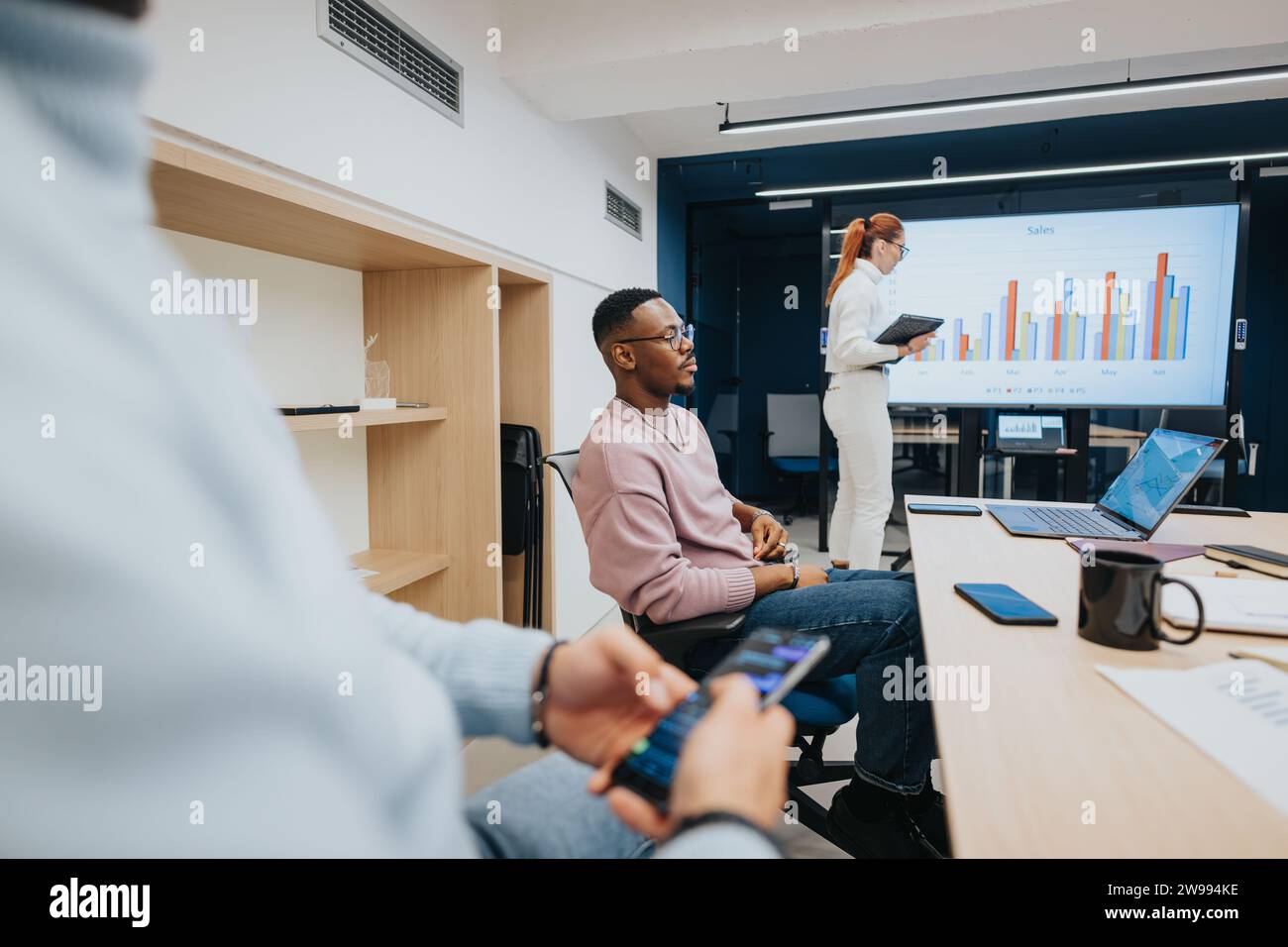 Business professionals collaborating and sharing ideas in a dynamic ...