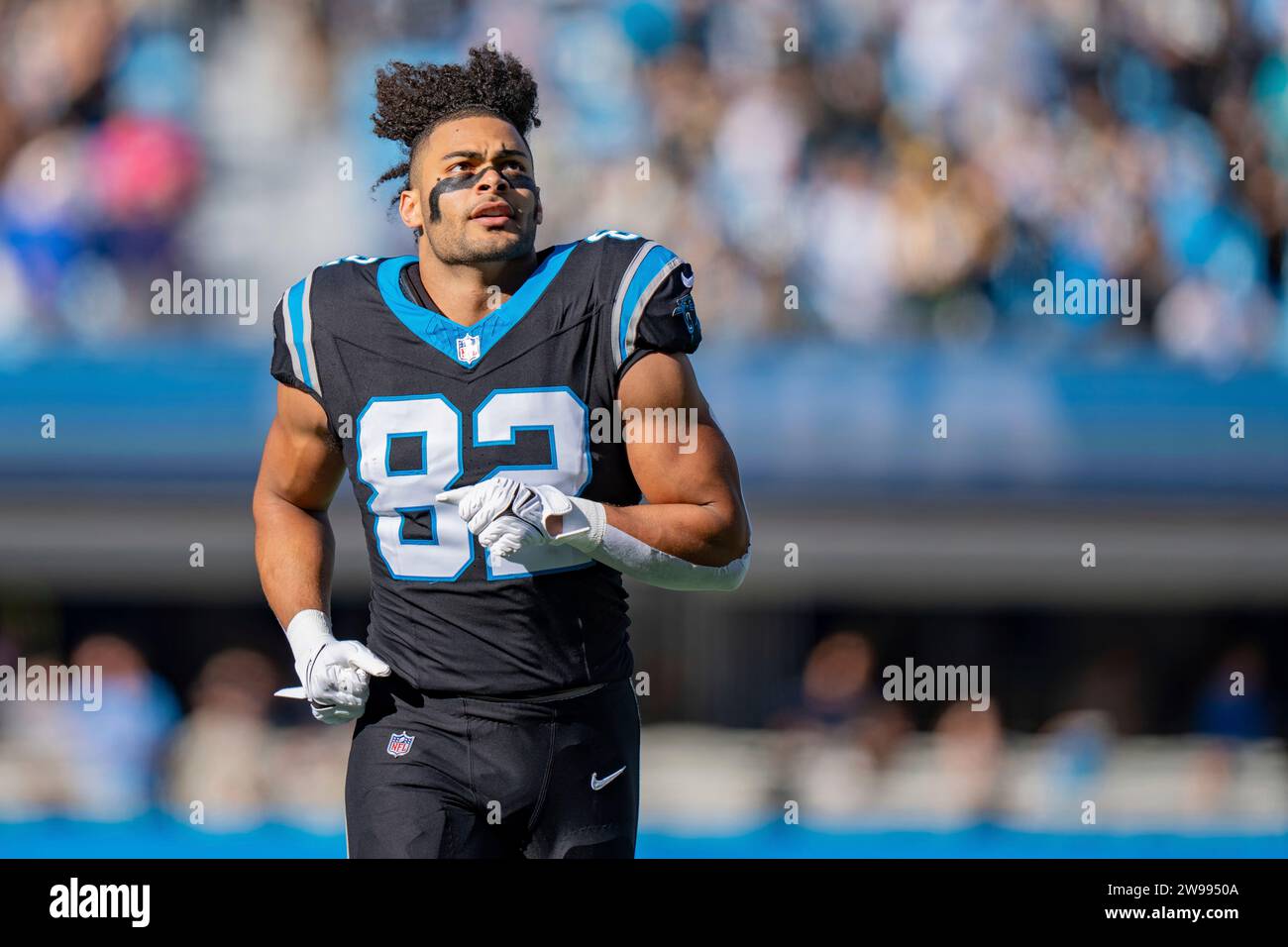 Carolina Panthers tight end Tommy Tremble (82) looks on before an NFL football game against the ...