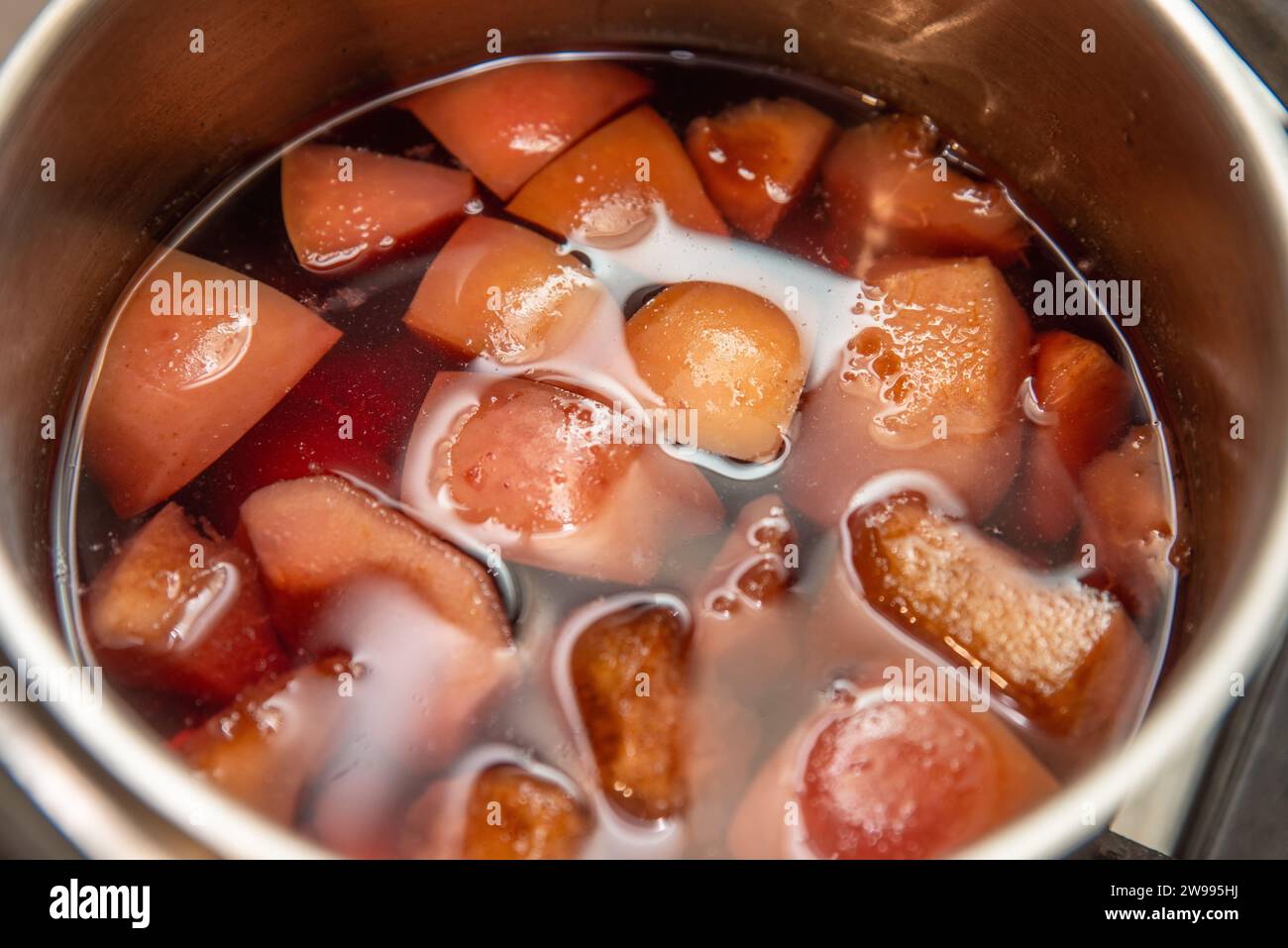 A pot of cooked fruit compote for Christmas Eve Stock Photo - Alamy