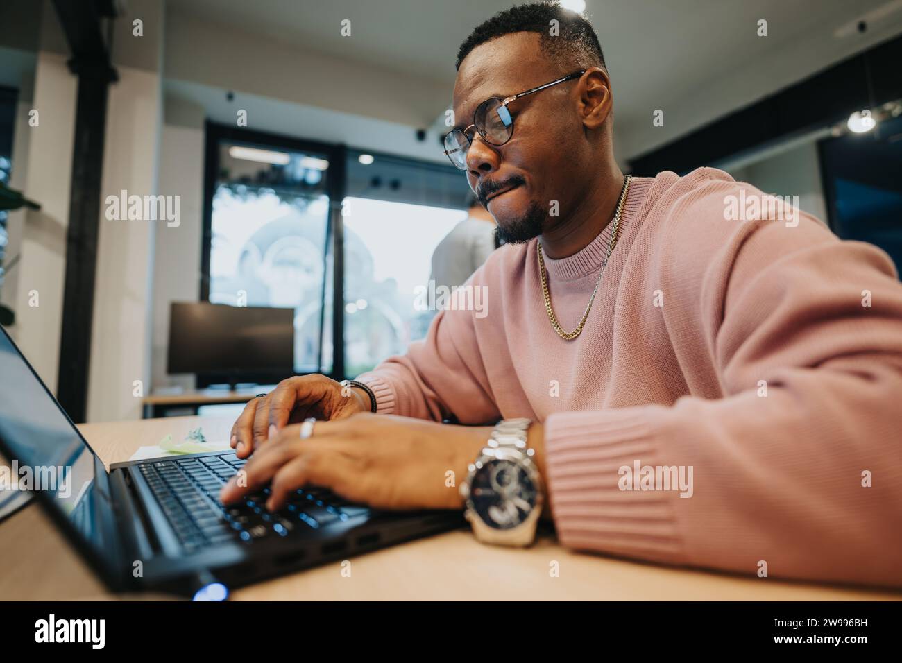 Creative individual working on a business plan and marketing strategy ...