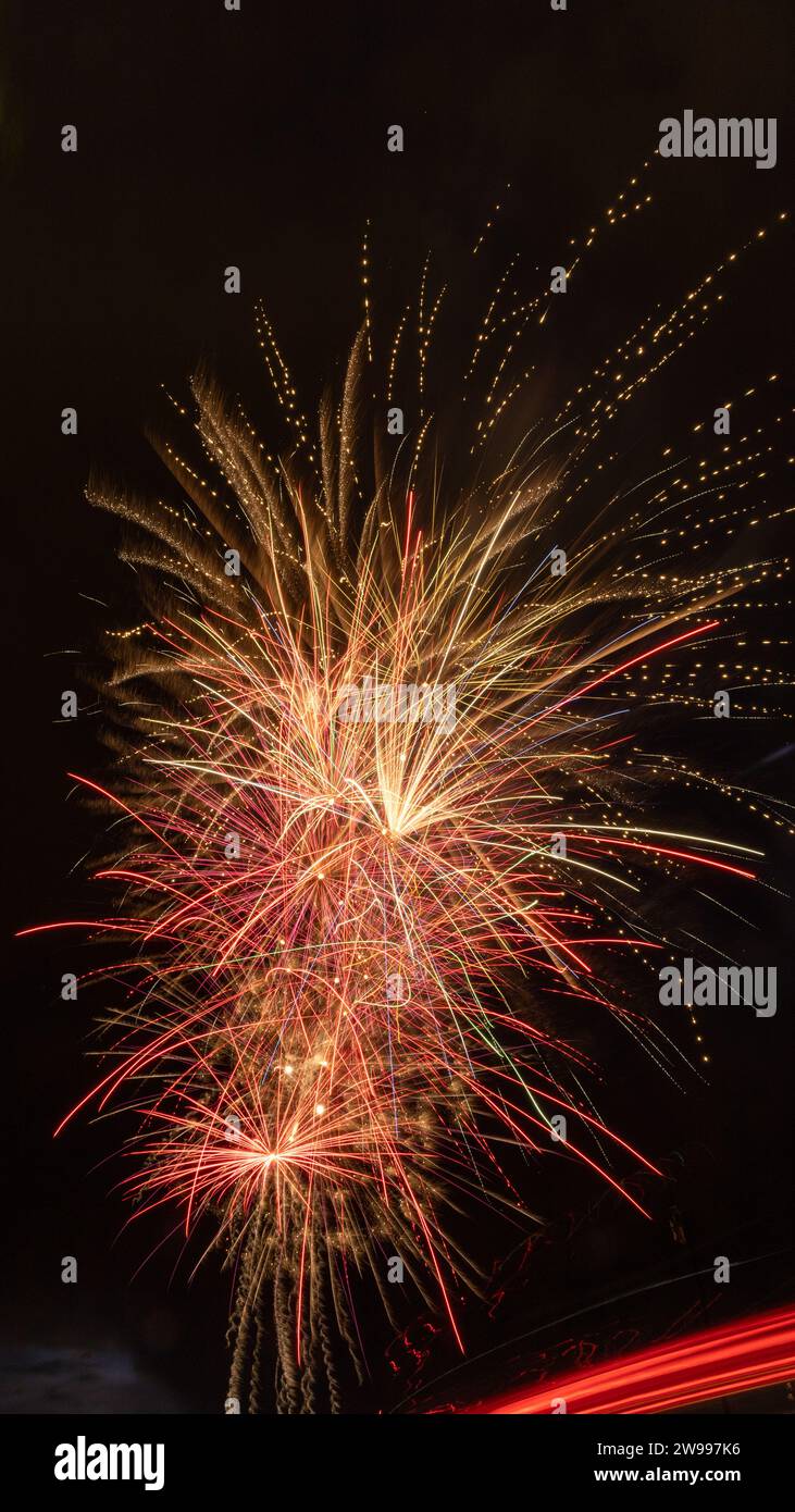 A beautiful night sky illuminated by bright colorful fireworks Stock ...