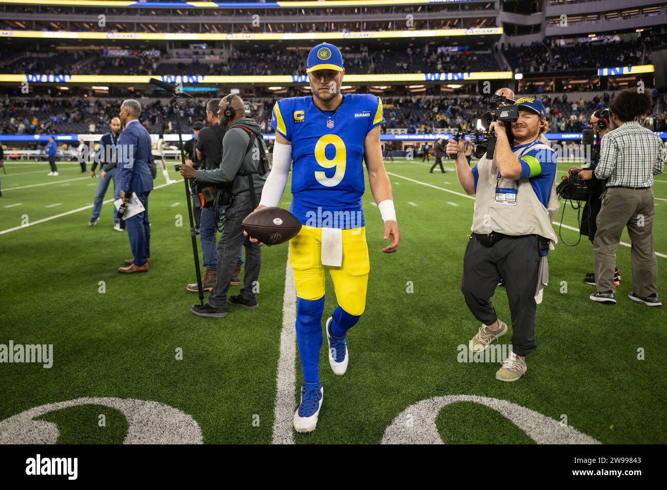 Los Angeles Rams quarterback Matthew Stafford (9) walks back to the ...