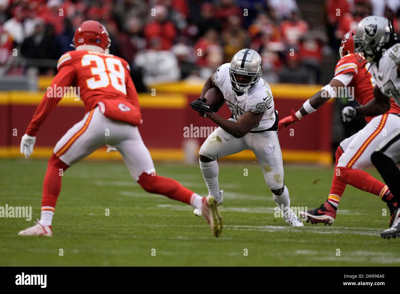 Las Vegas Raiders running back Zamir White (35) runs with the ball as ...