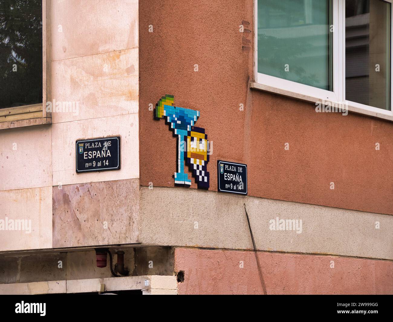The Pixel Street Art on buildings in Madrid, Spain Stock Photo - Alamy