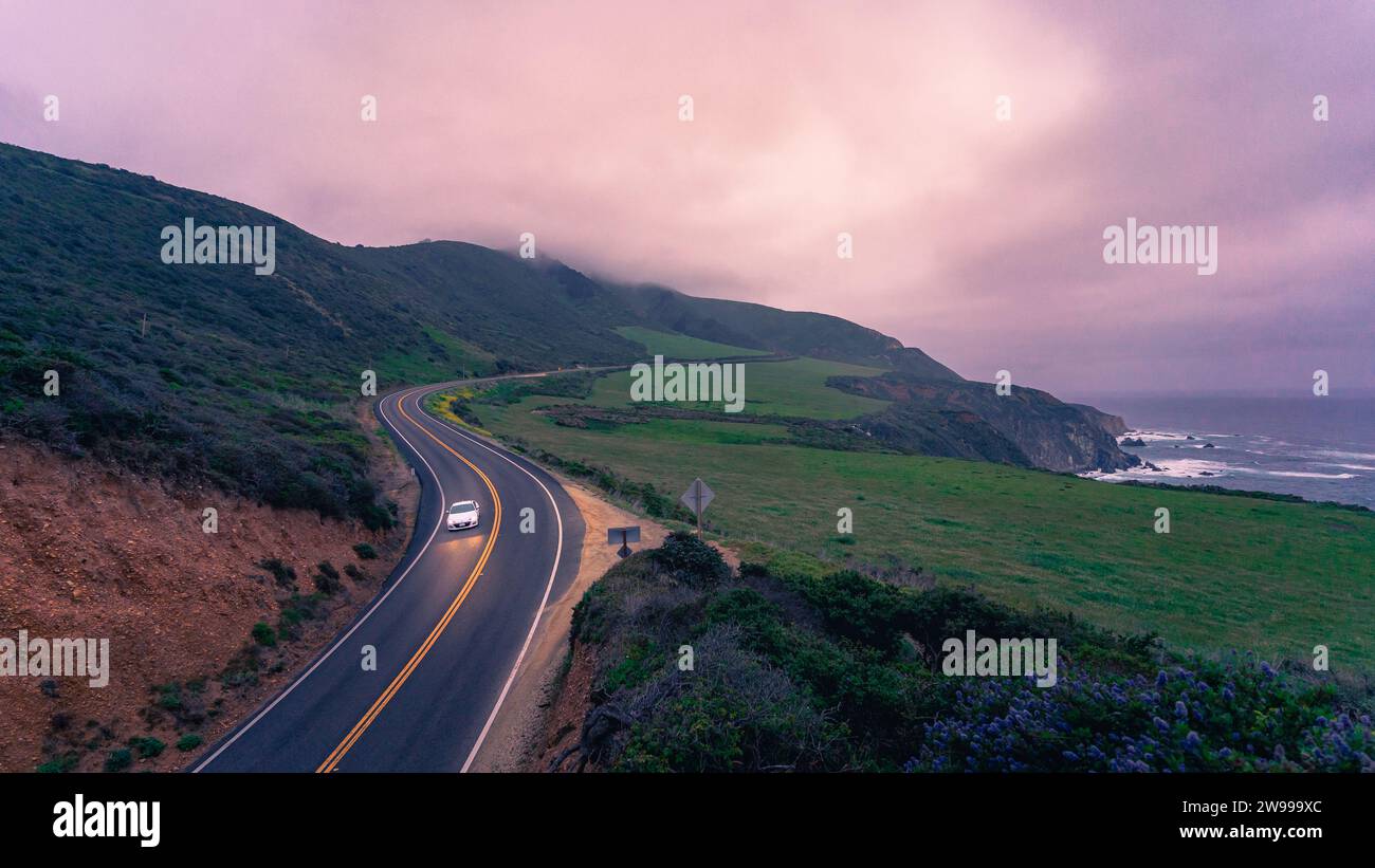 A white vehicle traversing a Bixby Bridge of Big Sur, Pacific Coast ...
