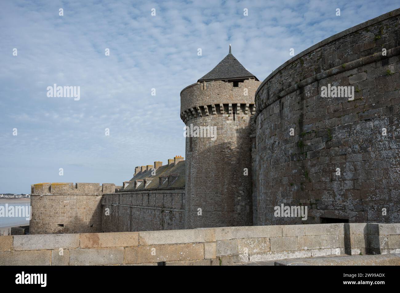 Photograph of the walls and stone towers from the town wall of Saint ...