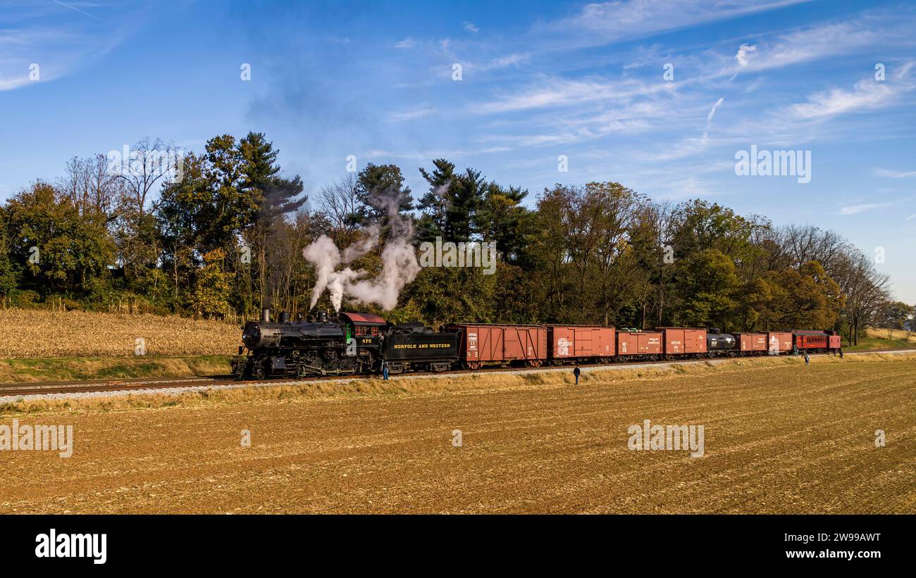An Aerial View of an Antique Steam Freight Passenger Train Blowing ...
