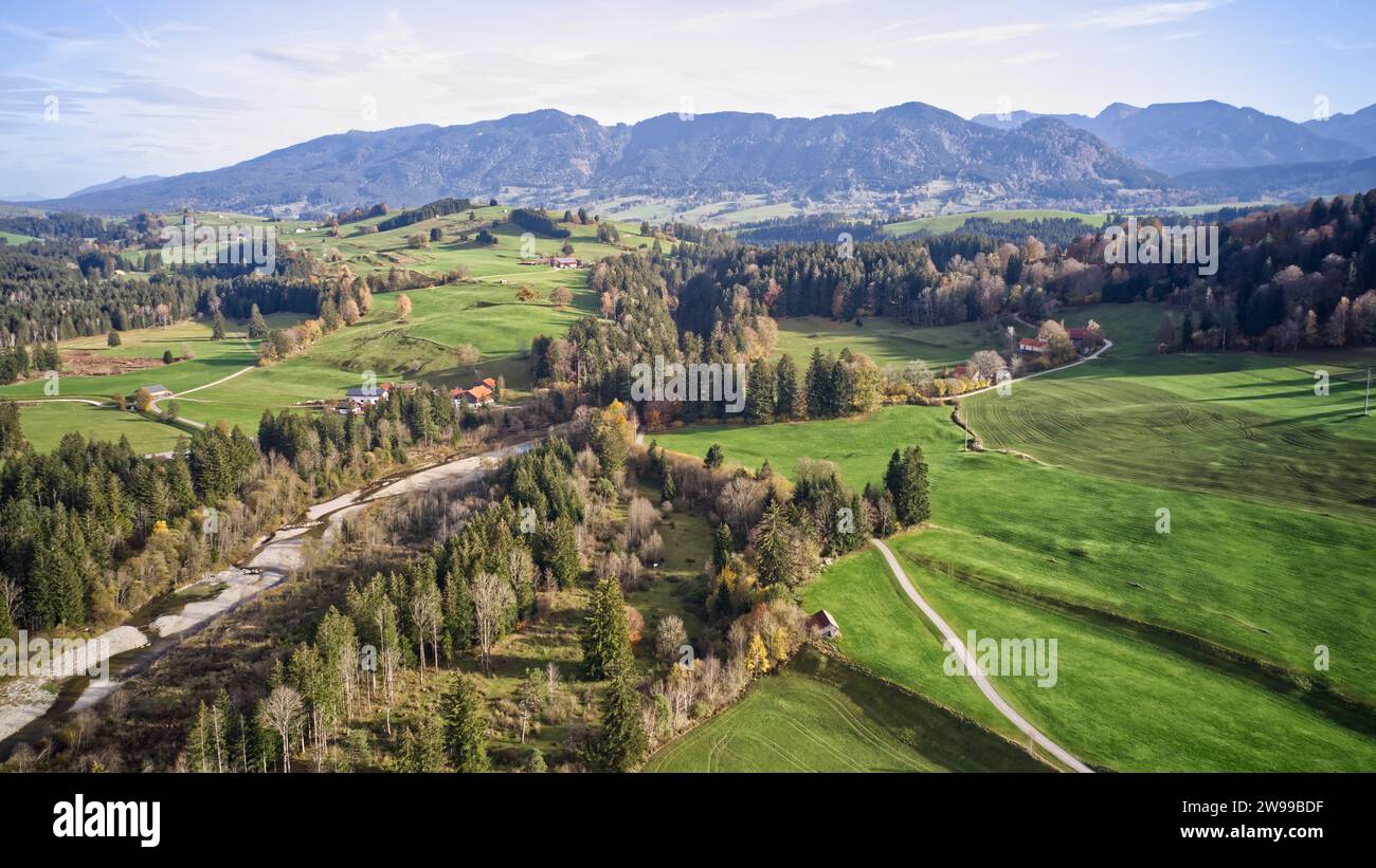 An aerial view of an empty expanse of land surrounded by majestic ...