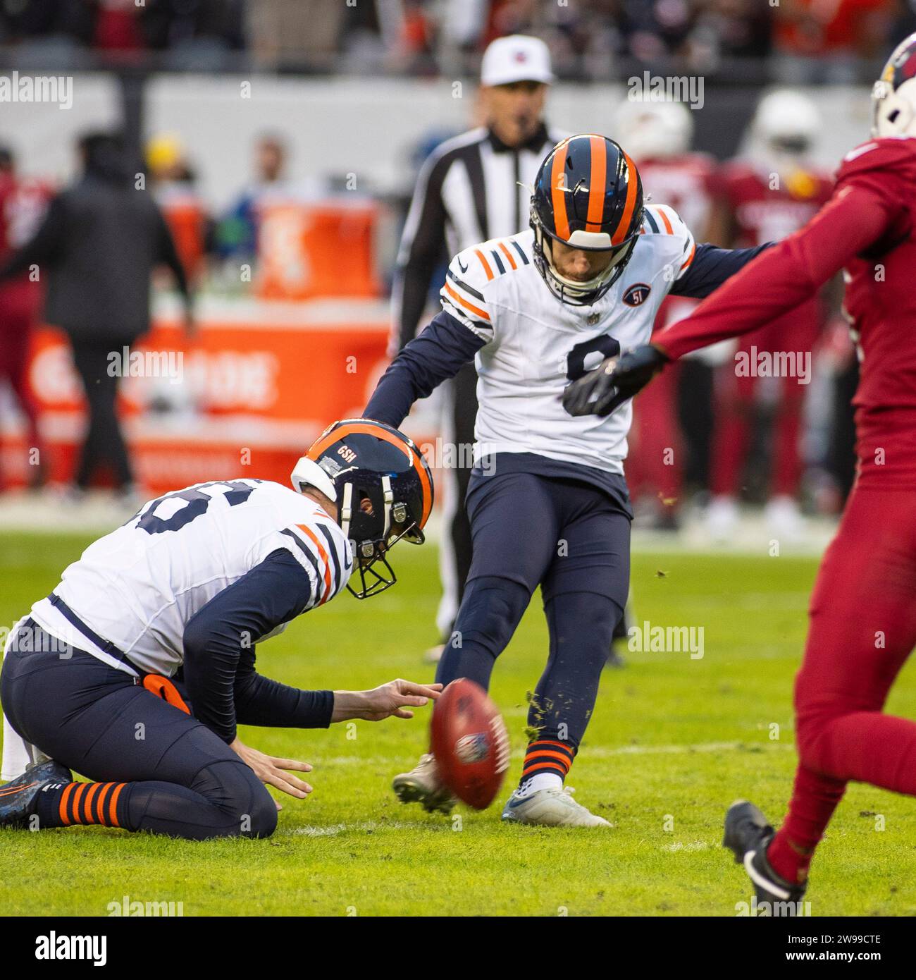 Chicago, IL, USA. 24th Dec, 2023. Chicago Bears #8 Cairo Santos kicks a ...