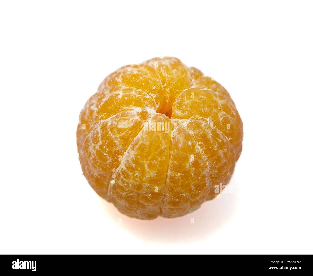 A freshly peeled tangerine isolated on a white surface Stock Photo - Alamy