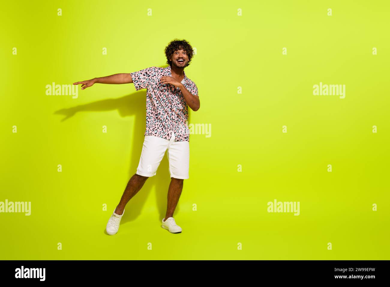 Full size photo of handsome young guy dancing have fun cheerful dressed ...