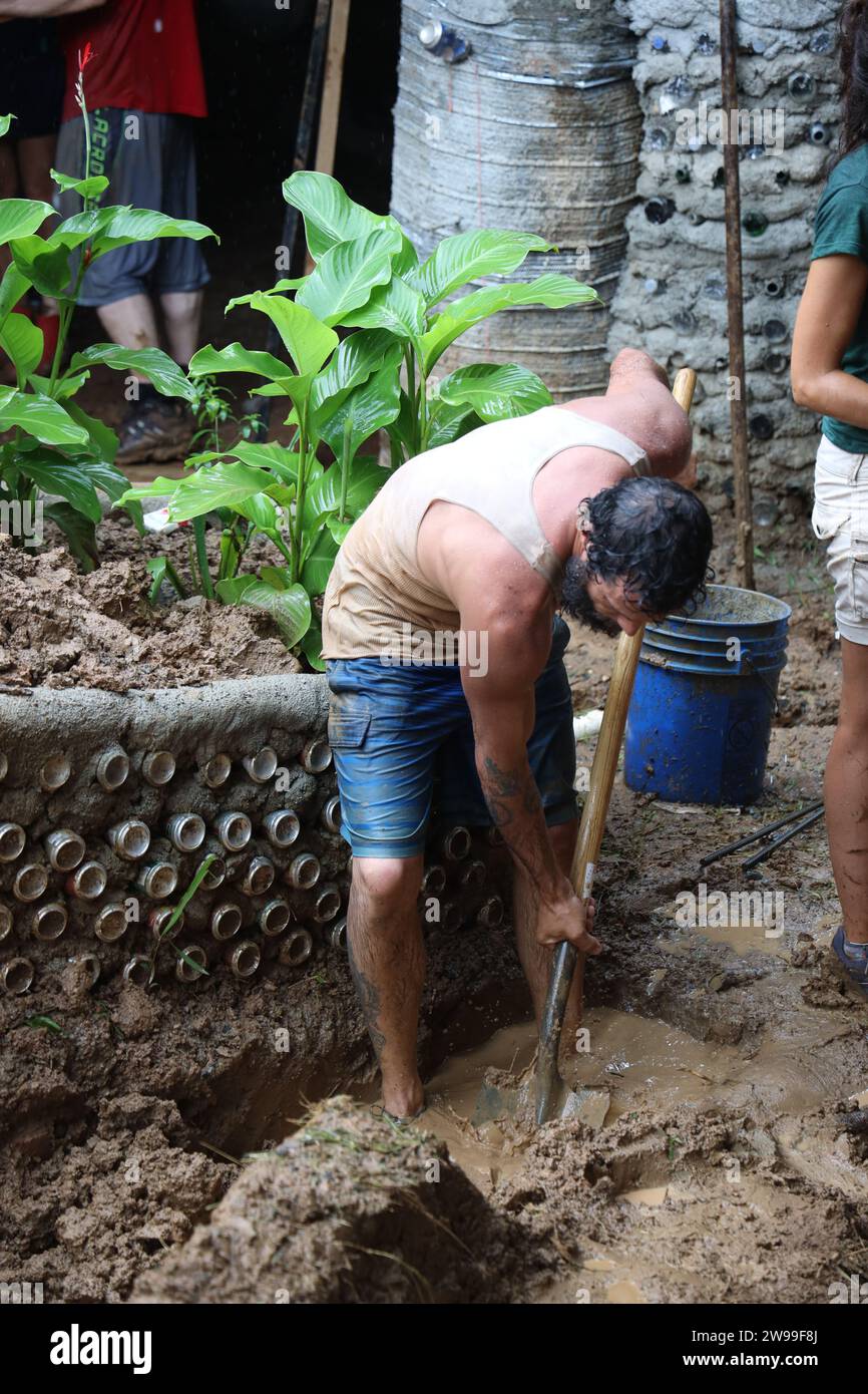 The volunteers working on building an Earthship in Aguada, Puerto Rico ...