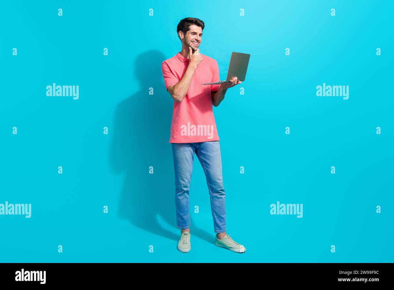 Full body photo of young thoughtful guy touch chin plan business costs ...