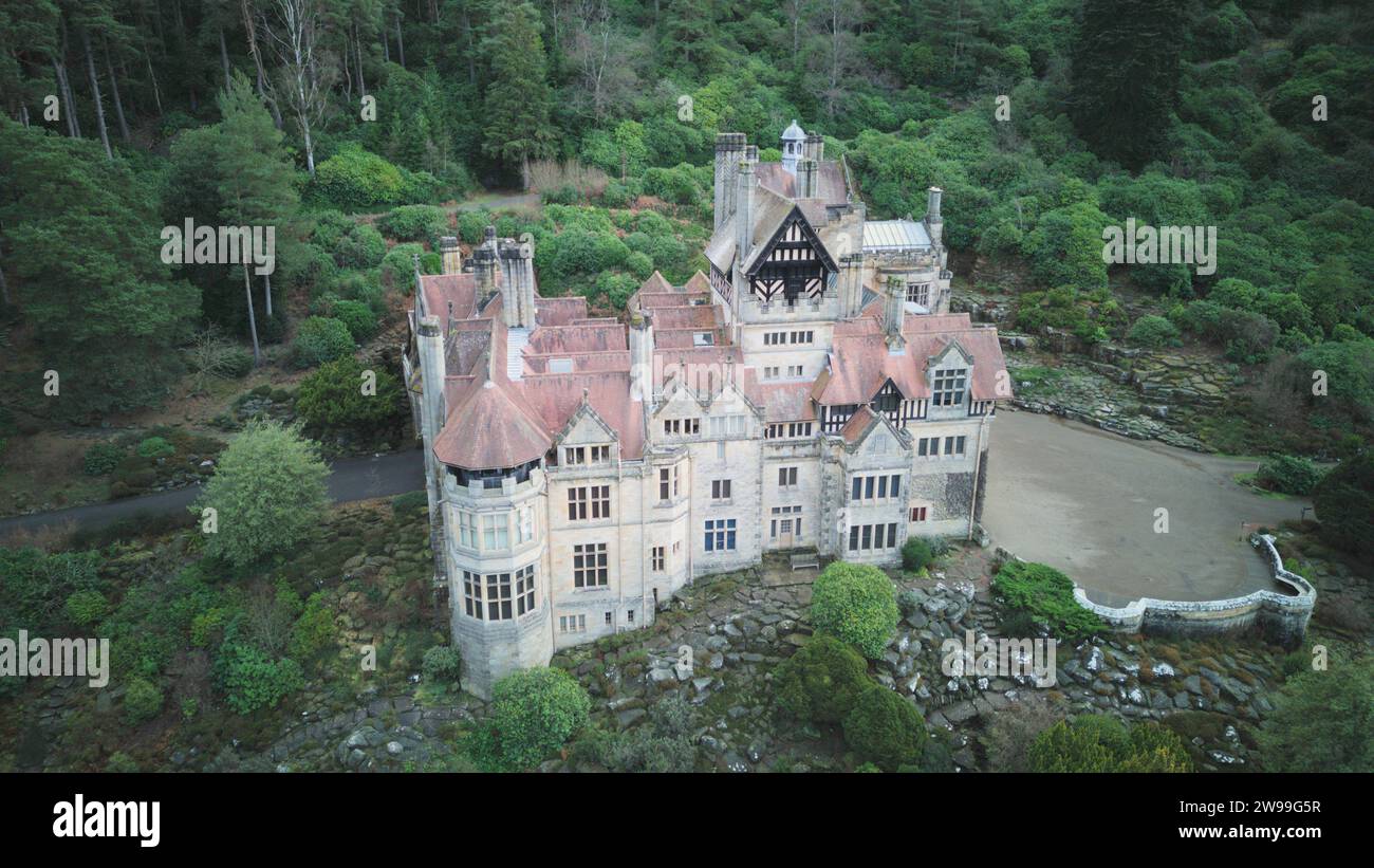 Aerial view of a picturesque cragside housenestled in the midst of a ...