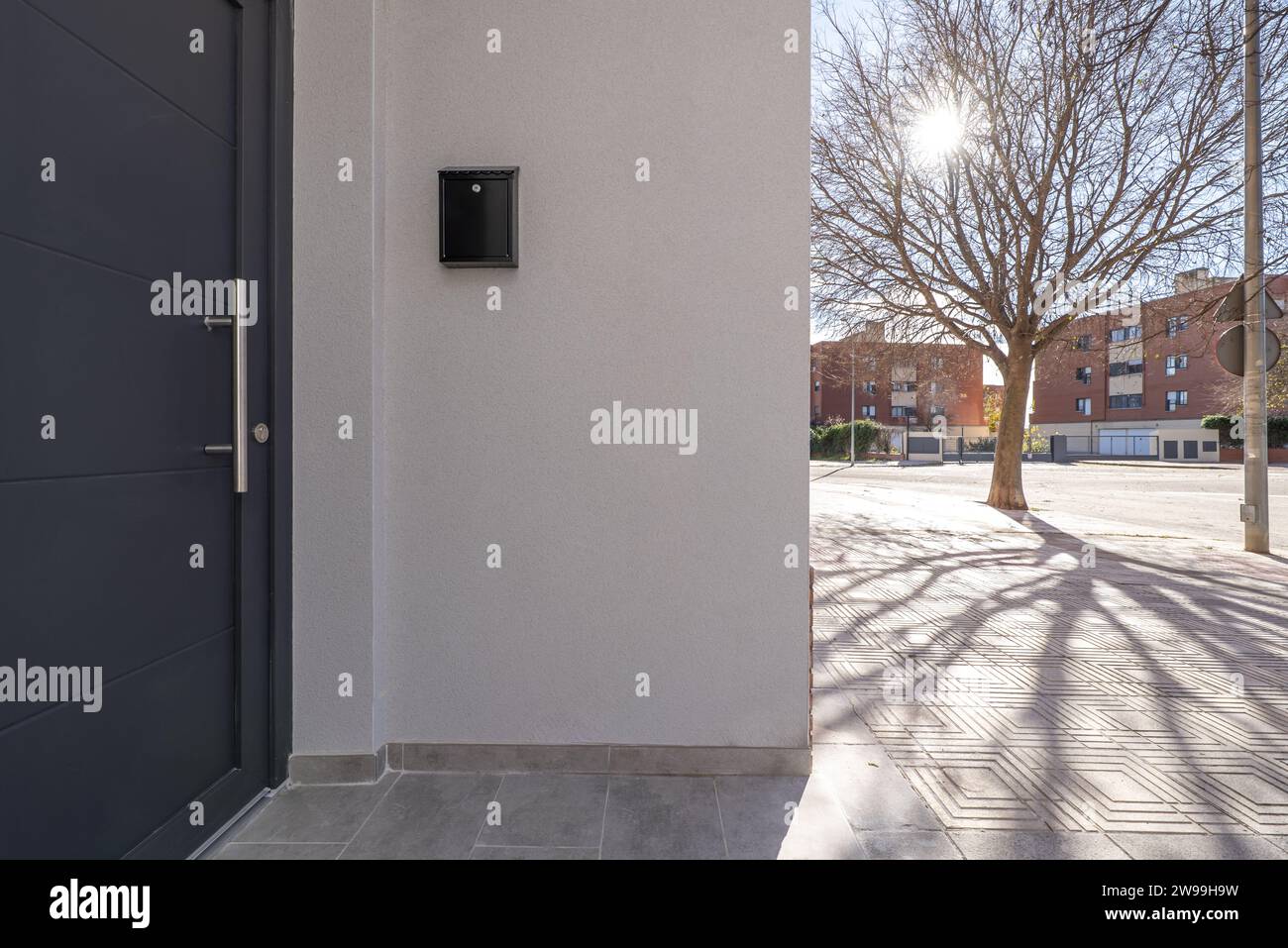 Access door to a home on the ground floor of a building Stock Photo - Alamy