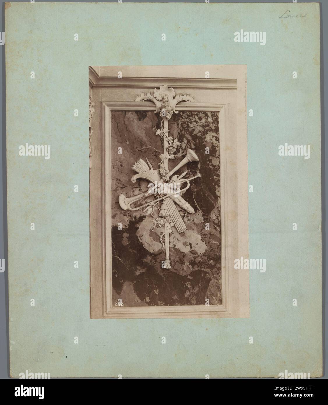 Relief of a arrow case, trombone and another wind instrument, c. 1875 ...