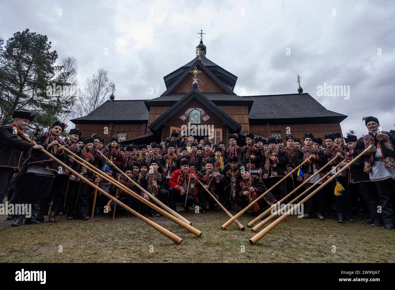 Men dressed in traditional hutsuls suits pose for a group photo in ...